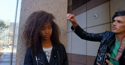 Female model posing for a photoshoot in ... | Stock Video | Pond5