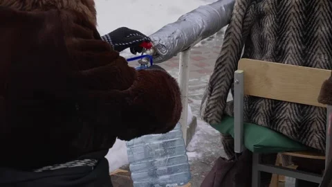 Female nun pours holy water from temple ... | Stock Video | Pond5