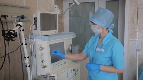 A female nurse prepares an electronic in... | Stock Video | Pond5