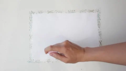 Female painter spraying water on paper b... | Stock Video | Pond5