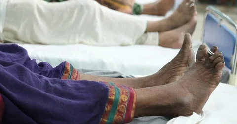 Female Patient foot on a hospital bed | Stock Video | Pond5