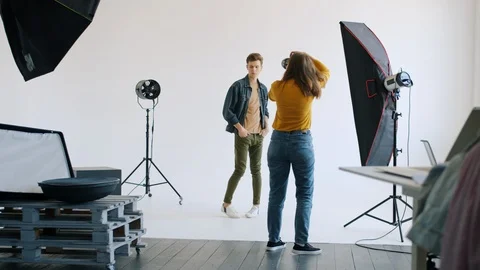 Female photographer showing body positio... | Stock Video | Pond5