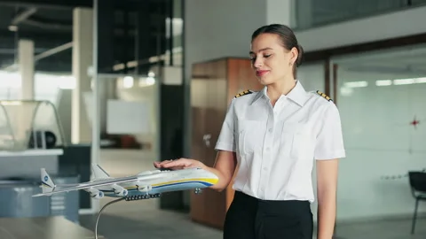 Female pilot, instructor standing in cla... | Stock Video | Pond5