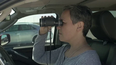 Female Police Officer On A Stakeout Tilt... | Stock Video | Pond5