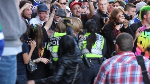 Female police officers struggling with g... | Stock Video | Pond5