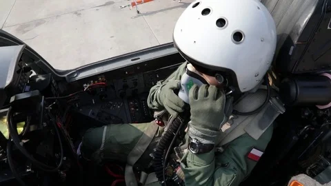 female Polish pilot adjusting flying hel... | Stock Video | Pond5