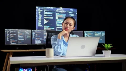 Female Programmer Thinking Something Whi... | Stock Video | Pond5