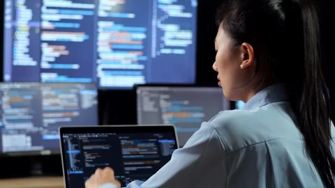 Female Programmer Thinking Writing Code ... | Stock Video | Pond5