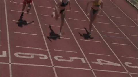 Female racers reach the finish line. | Stock Video | Pond5