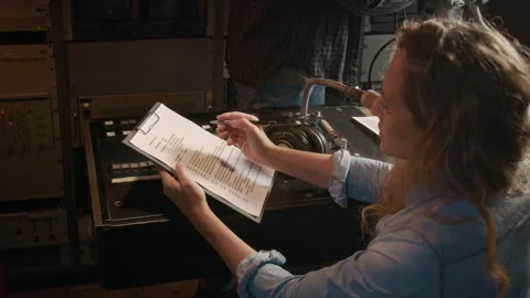 Female Reporter Rehearsing Script while ... | Stock Video | Pond5