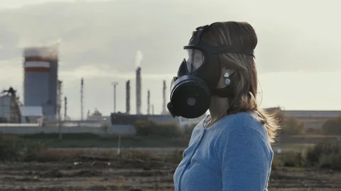 Female in Respirator Gas Mask Walking on... | Stock Video | Pond5
