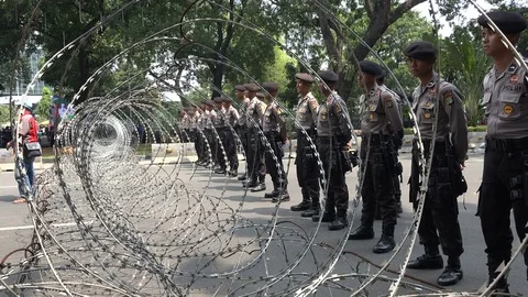 Female riot police officers at protest r... | Stock Video | Pond5
