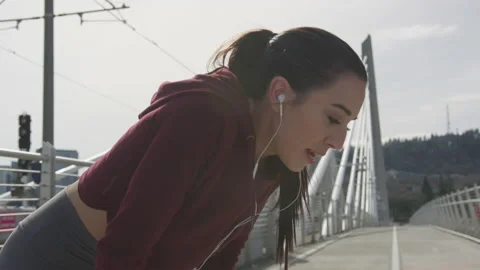 Female Runner Catching Her Breath After ... | Stock Video | Pond5