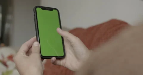 Female scrolling on smart phone with gre... | Stock Video | Pond5