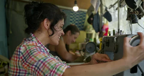 Female Seamstress Sew Military Uniform a... | Stock Video | Pond5