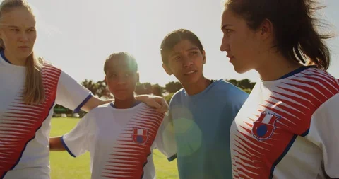 Female soccer player encouraging her tea... | Stock Video | Pond5