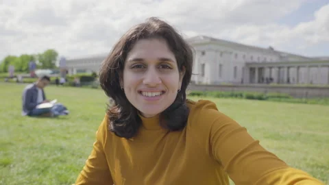 Female Student Talking to Camera on Vide... | Stock Video | Pond5