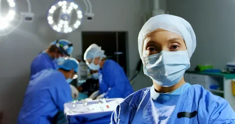 Female surgeon standing at hospital 4k | Stock Video | Pond5