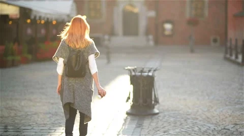 Female throwing empty coffee cup on the ... | Stock Video | Pond5