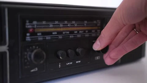 female tuning frequency on retro radio w... | Stock Video | Pond5
