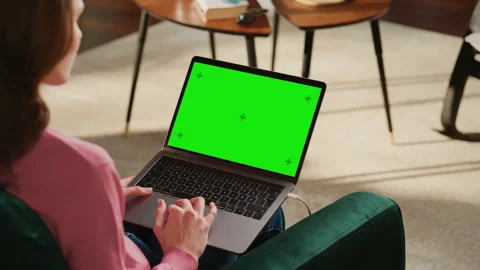 Female Using Laptop Green Screen at Home | Stock Video | Pond5