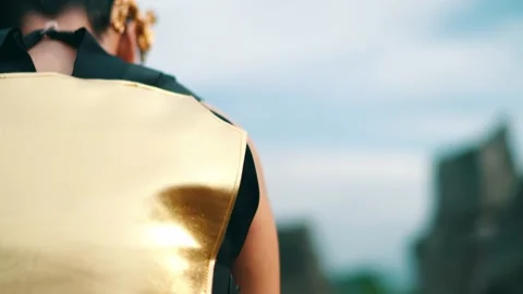 a female warrior in golden armor walked ... | Stock Video | Pond5