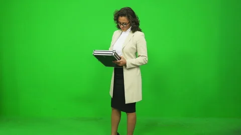 Female Writing on Notepad Green Screen | Stock Video | Pond5