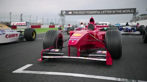 Ferrari F1 1990's racecar on grid. slow ... | Stock Video | Pond5