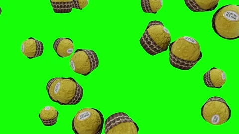 Ferrero Rocher Chocolates Falling on Gre... | Stock Video | Pond5