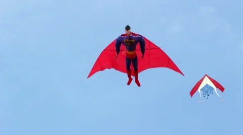 Festival kites, kite-shaped superman | Stock Video | Pond5