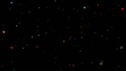 festive confetti falling. Round confetti... | Stock Video | Pond5