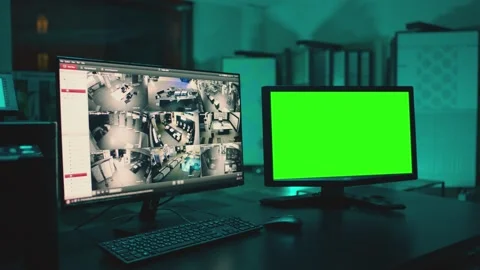 Few monitors with green screen in dark m... | Stock Video | Pond5