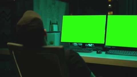 Few monitors with green screen in dark m... | Stock Video | Pond5