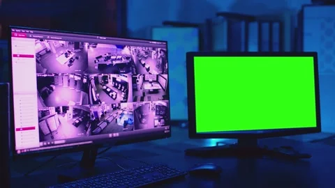 Few monitors with green screen in dark m... | Stock Video | Pond5