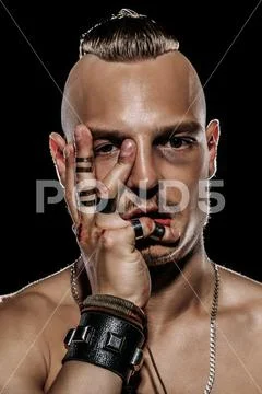 Photograph: Fight club, MMA. Portrait of a bad guy fighter with a face ...