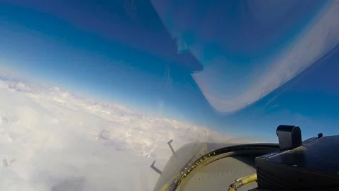 Fighter jet flying and turning on the cl... | Stock Video | Pond5