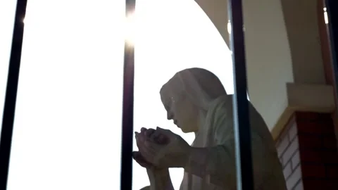 Figure of Jesus Christ in the sunlight | Stock Video | Pond5