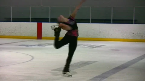 figure skater catch foot spin | Stock Video | Pond5