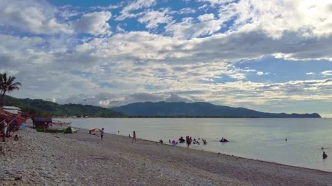 Filipino Families at Mabua Pebble Beach ... | Stock Video | Pond5