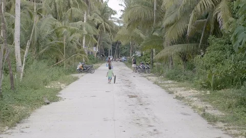 Filipino little boy playing Kariling, ty... | Stock Video | Pond5