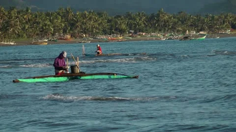 Filipino woman catching Milkfish fry in ... | Stock Video | Pond5