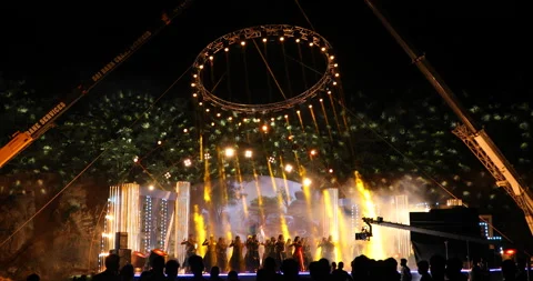 Film Crew silhouettes at stage Night tim... | Stock Video | Pond5