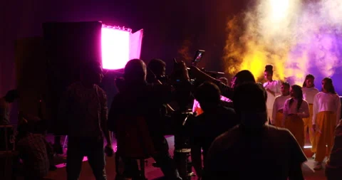 Film Crew silhouettes at stage Night tim... | Stock Video | Pond5