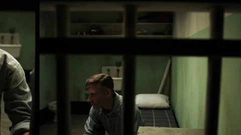 Film montage of inmates in prison cells,... | Stock Video | Pond5