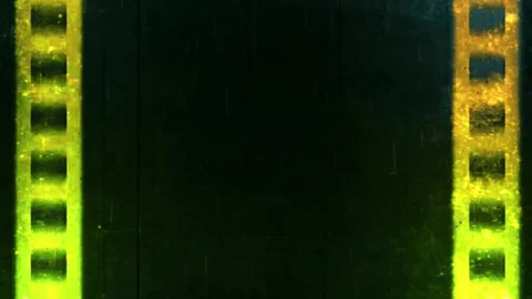 Film reel negative in yellow with dark g... | Stock Video | Pond5