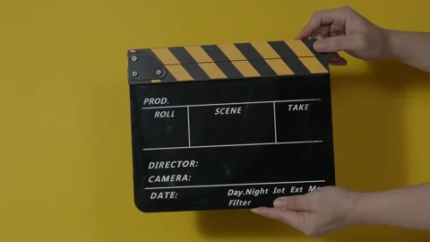 Film slate or Movie clapperboard hitting... | Stock Video | Pond5