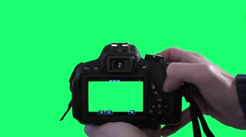 Filming with dslr camera on green screen... | Stock Video | Pond5