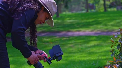 Filmmaker with semi professional camera ... | Stock Video | Pond5