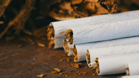 Filter homemade cigarettes or roll-up ne... | Stock Video | Pond5