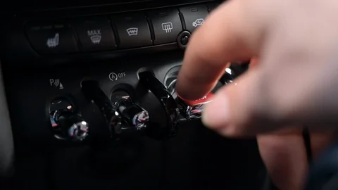 Finger pushing red start stop engine but... | Stock Video | Pond5